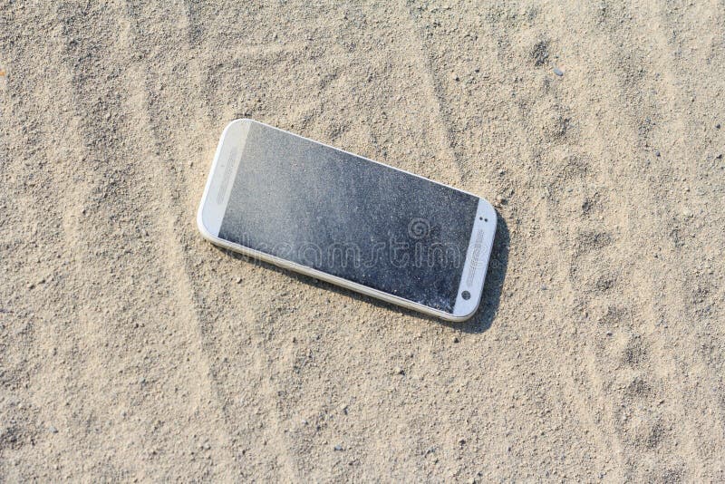 Smartphone Lost in the Sand Stock Photo - Image of freedom, help: 102586774