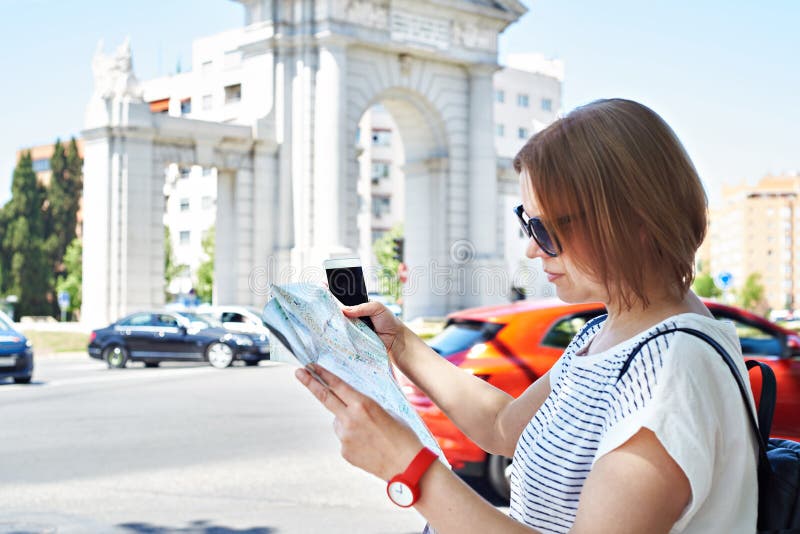 Smartphone and Map in Hands of Woman Tourist Stock Photo - Image of ...
