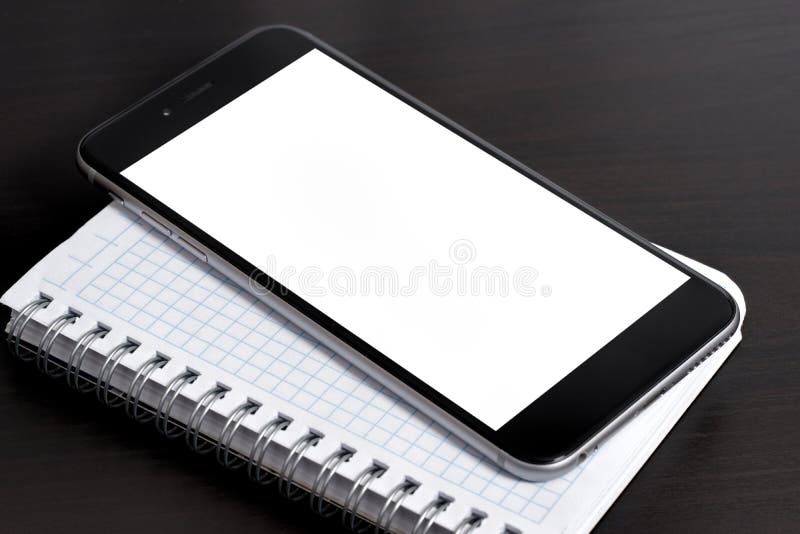 Smartphone and notepad stock image. Image of notebook - 74520485