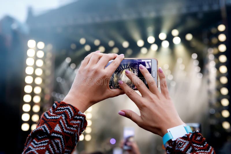 Smartphone Over the Crowd at a Concert Stock Image - Image of digital ...