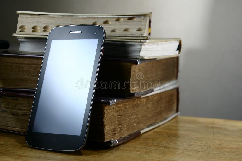 Smartphone or Phablet and Old Books Stock Photo - Image of books, talk ...