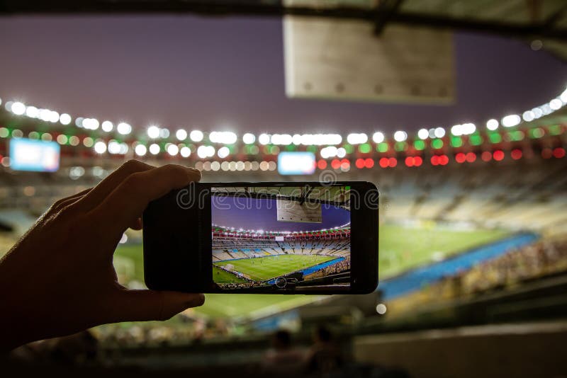 Smartphone Photographing Football Game on the Stadium Stock Photo ...