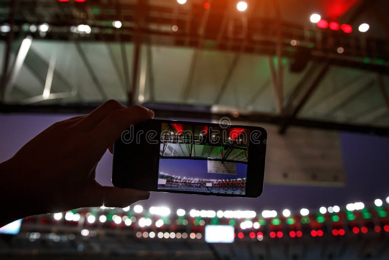 Smartphone Photographing Football Game on the Stadium Stock Photo ...