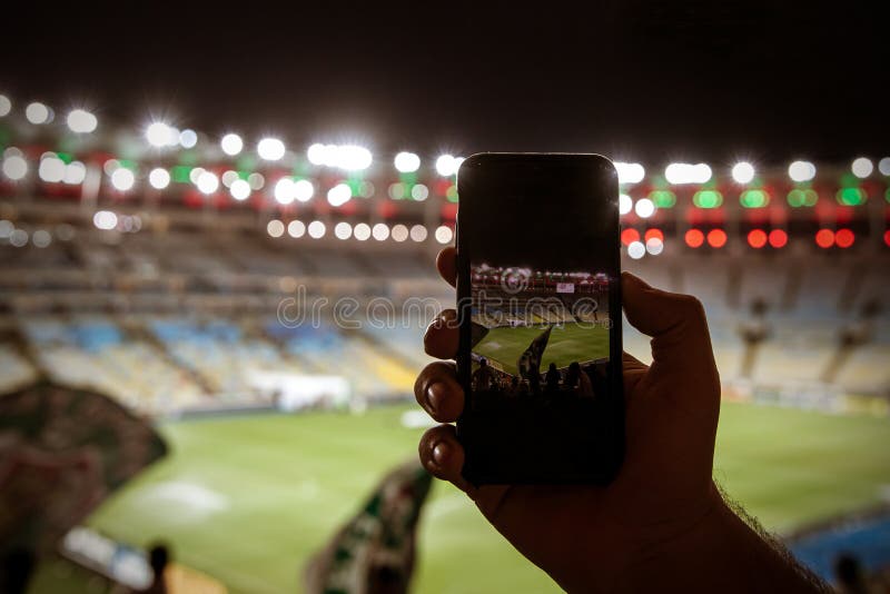 Smartphone Photographing Football Game on the Stadium Stock Photo ...