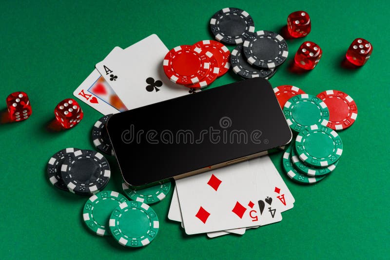 Smartphone with Playing Cards and Chips on a Green Felt Tabletop Stock ...