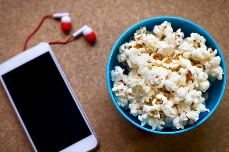 Smartphone and Popcorn in Bowl Stock Image - Image of smartphone, smart ...