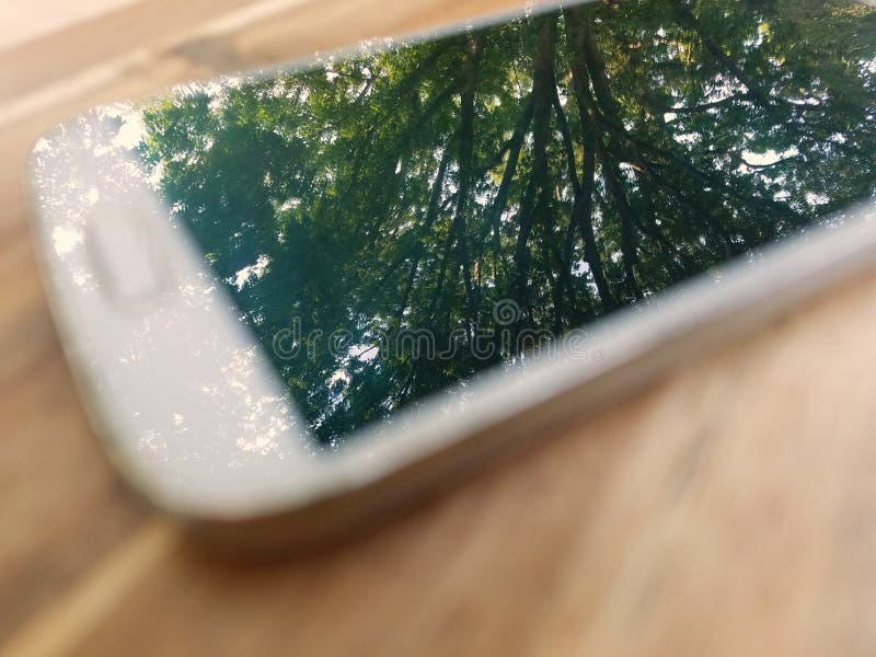 Smartphone reflection stock image. Image of wireless - 77060785