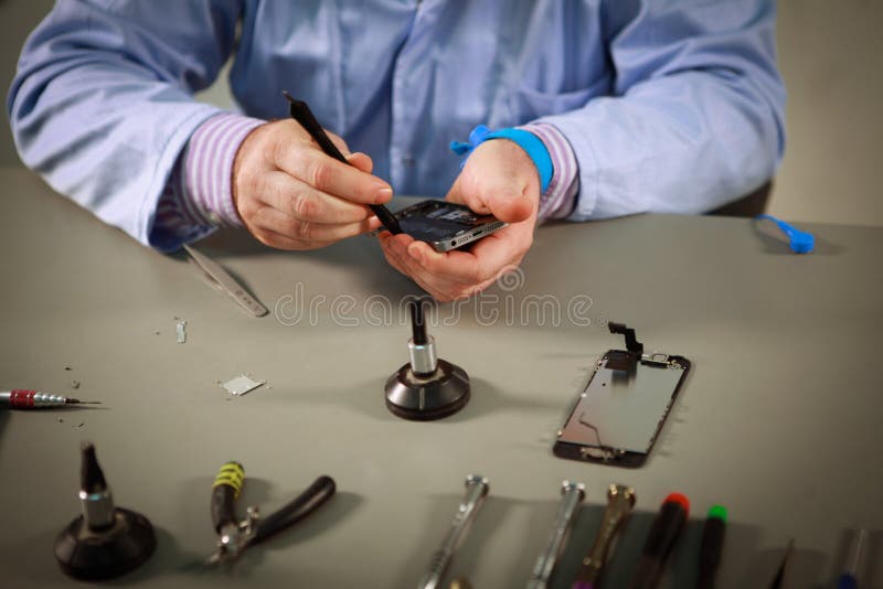 Smartphone repair stock image. Image of examining, repairing - 53231847