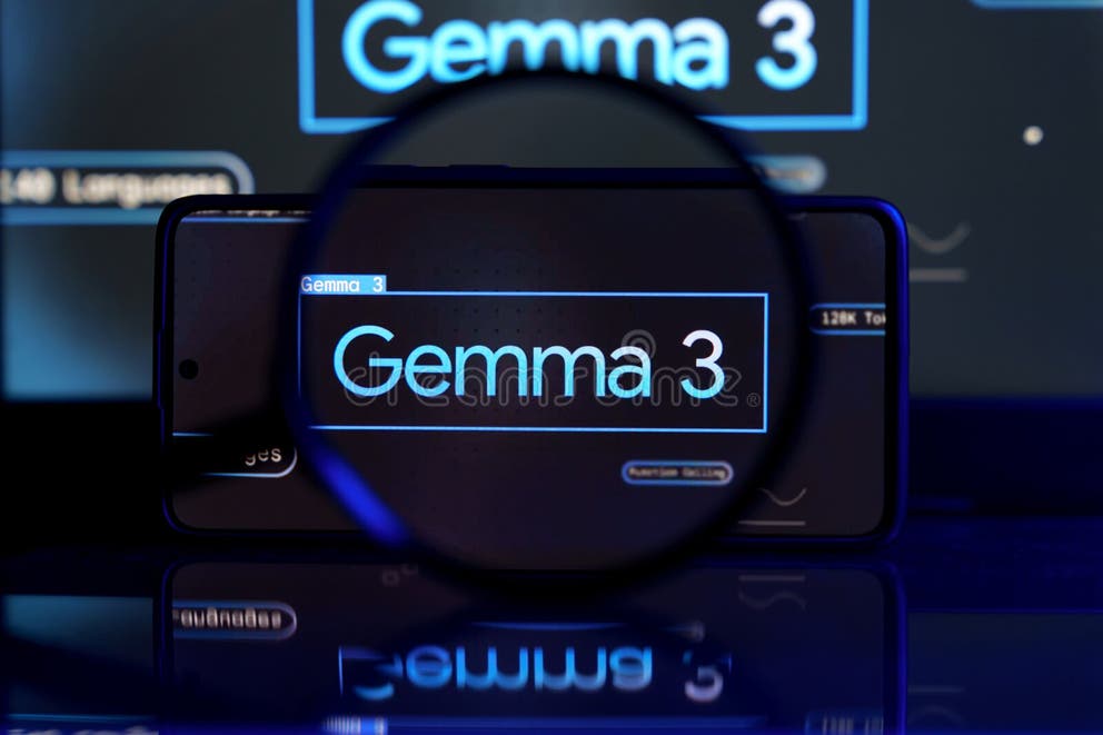 Smartphone Screen Displaying Google Gemma 3 AI Model, with a Larger Screen in the Background ...