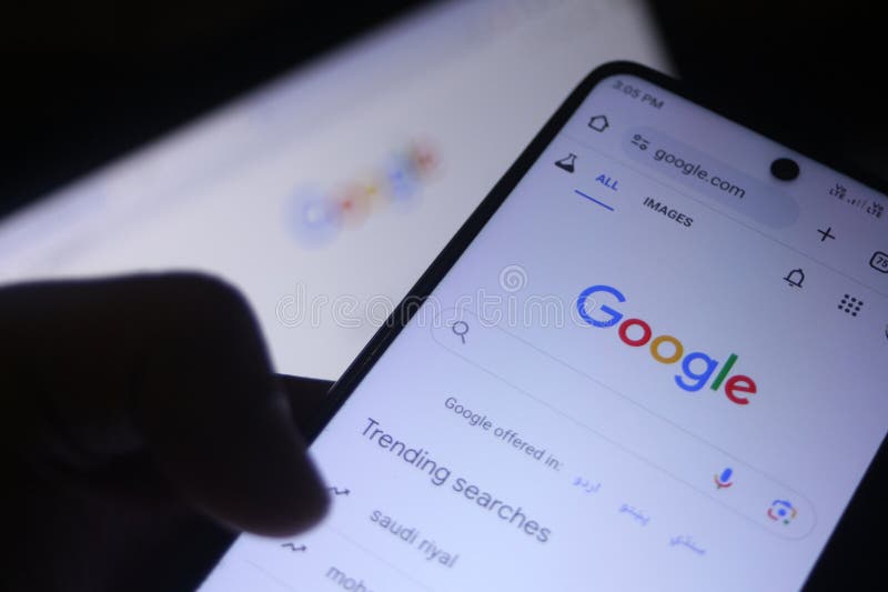 Google Search Displayed on a Smartphone and Computer Screen Editorial ...