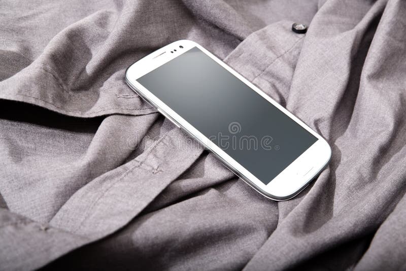 Smartphone on a shirt stock photo. Image of screen, cloth - 39618386