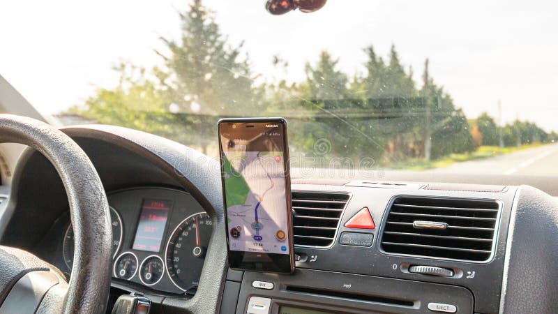 Smartphone Showing Waze Maps To Show the Way Thru the City Editorial ...