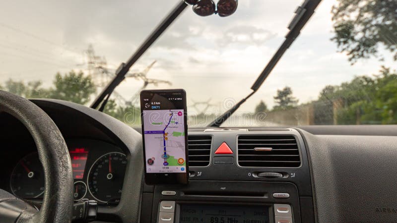 Smartphone Showing Waze Maps To Show the Way Thru the City Editorial ...