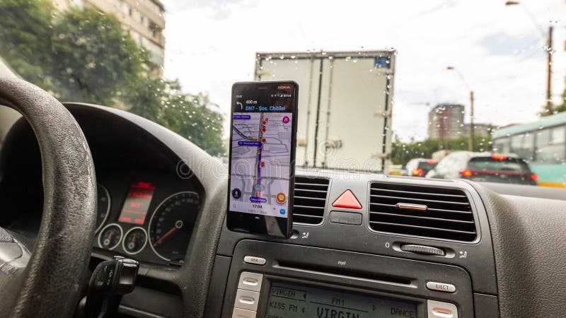 Smartphone Showing Waze Maps To Show the Way Thru the City Editorial ...