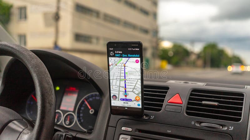 Smartphone Showing Waze Maps To Show the Way Thru the City Editorial ...