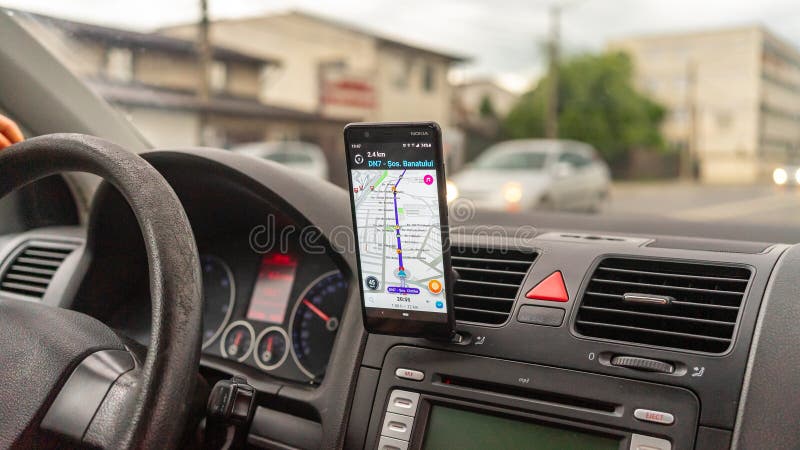 Smartphone Showing Waze Maps To Show the Way Thru the City Editorial ...