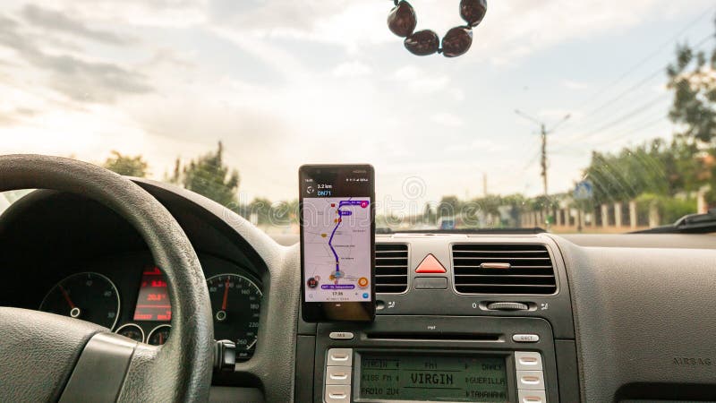 Smartphone Showing Waze Maps To Show the Way Thru the City Editorial ...