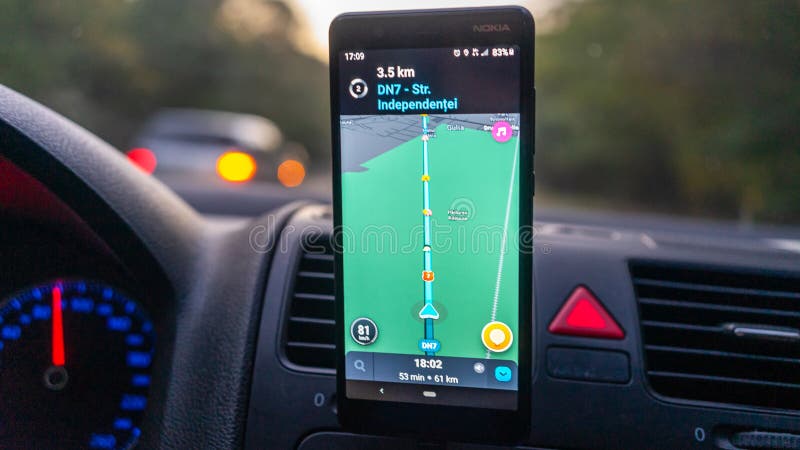 Smartphone Showing Waze Maps To Show the Way Thru the City Editorial ...