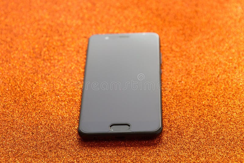 Smartphone and Start Button and Fingerprint in the Foreground Stock ...