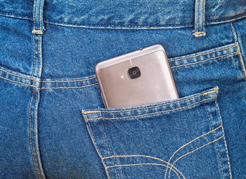 Smartphone Sticking Out of the Jeans Pocket Stock Photo - Image of ...