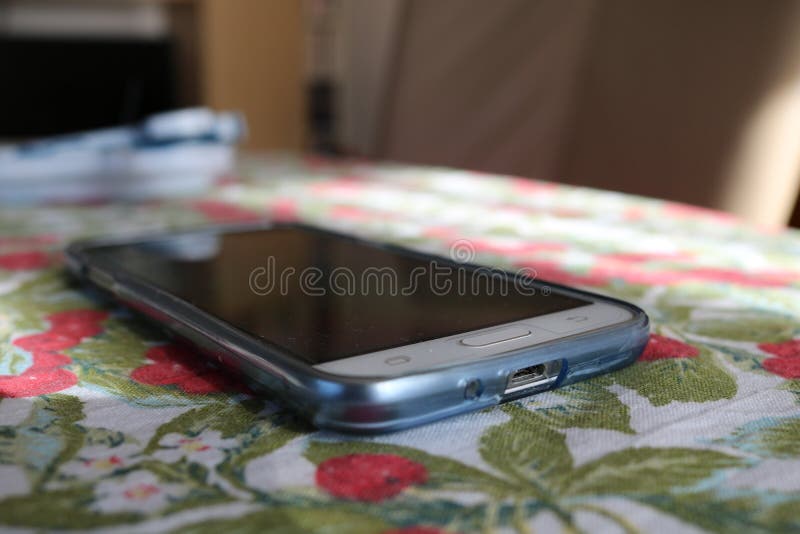 Smartphone on a table stock image. Image of whatsapp - 99459497