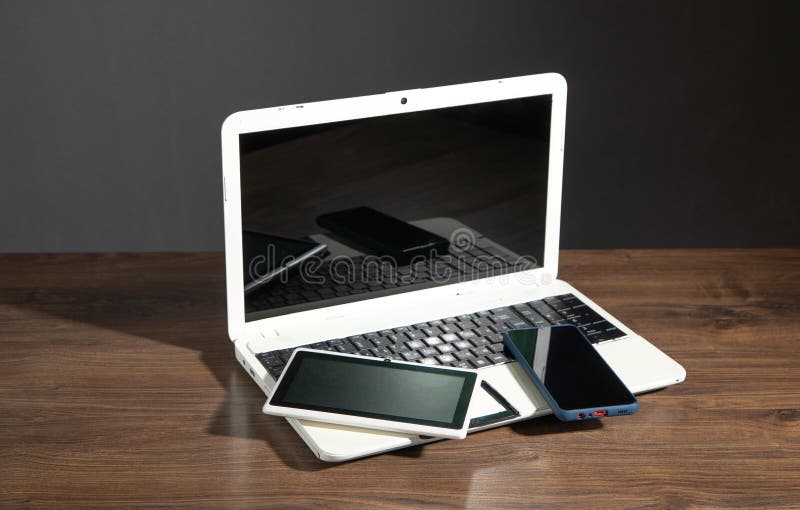 Smartphone, Tablet, Laptop Computer on the Table Stock Image - Image of ...