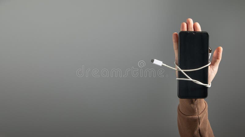Smartphone Tied on Human Hand with a Cable. Smartphone Addiction Stock ...