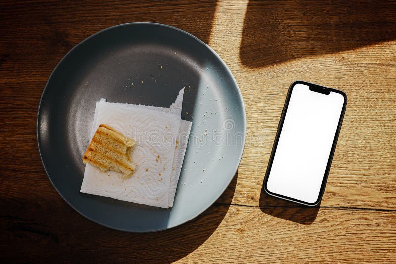 Smartphone and Toasted Bread on the Plate in Kitchen Stock Photo ...
