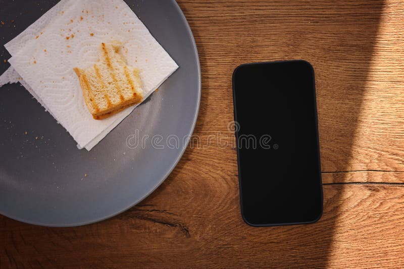 Smartphone and Toasted Bread on the Plate in Kitchen Stock Image ...