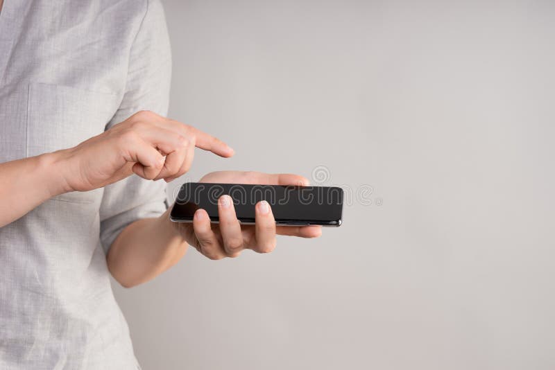 Smartphone with a Touch Screen in a Woman& X27;s Hand. Use Your Phone ...