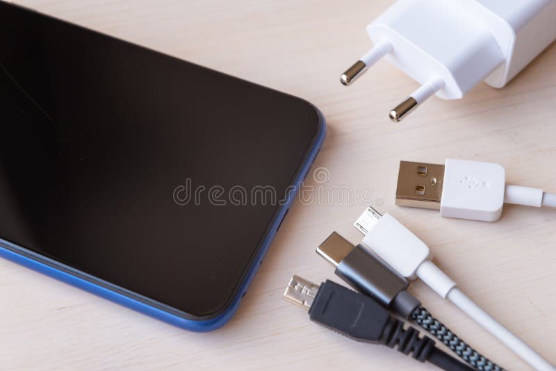 Smartphone, USB Charger, Micro USB Cables Stock Photo - Image of ...