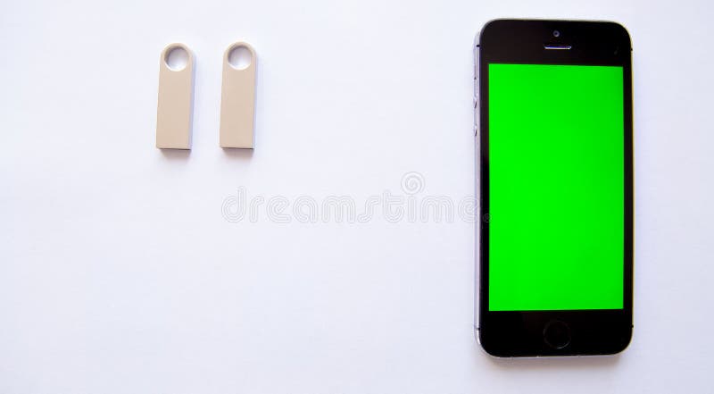 Smartphone and USB Flash Drive on White Background. Green Screen Stock ...