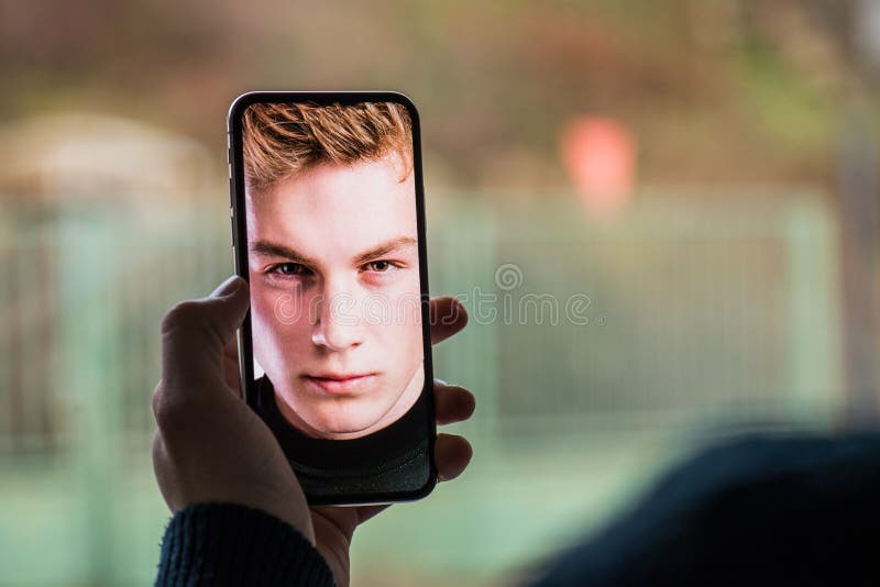 A Smartphone Using Face ID Recognition System. Stock Photo - Image of ...