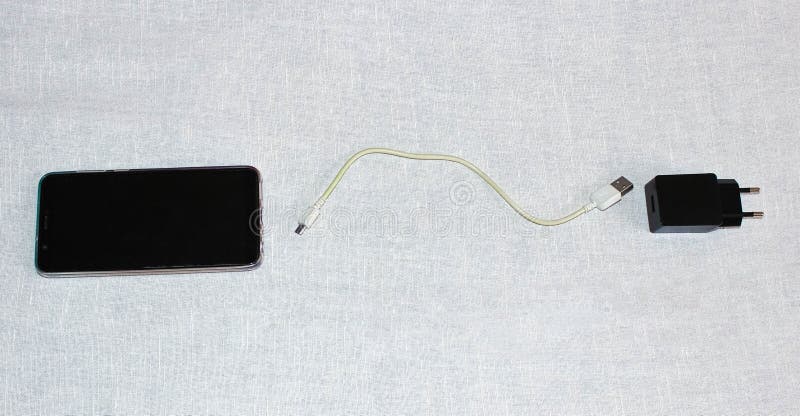 Smartphone, Wire, Charger on a Light Background Separately Stock Image ...