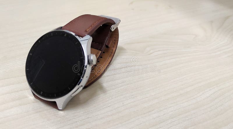 Smartwatch on the table stock image. Image of teknologi - 327003403