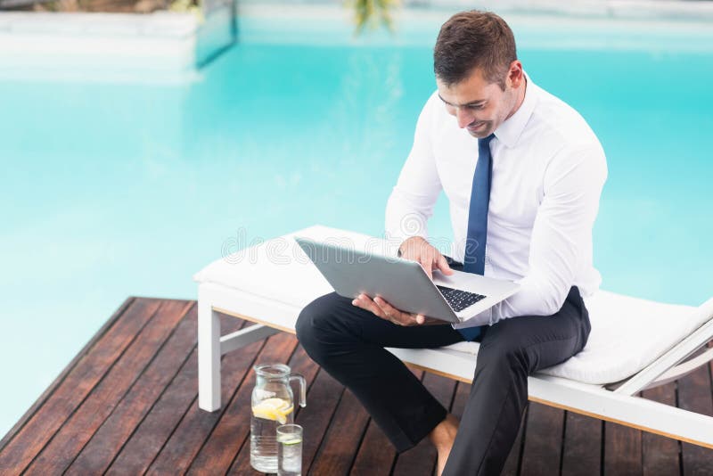 Smarty Dressed Man Using Laptop Stock Photo - Image of poolside ...