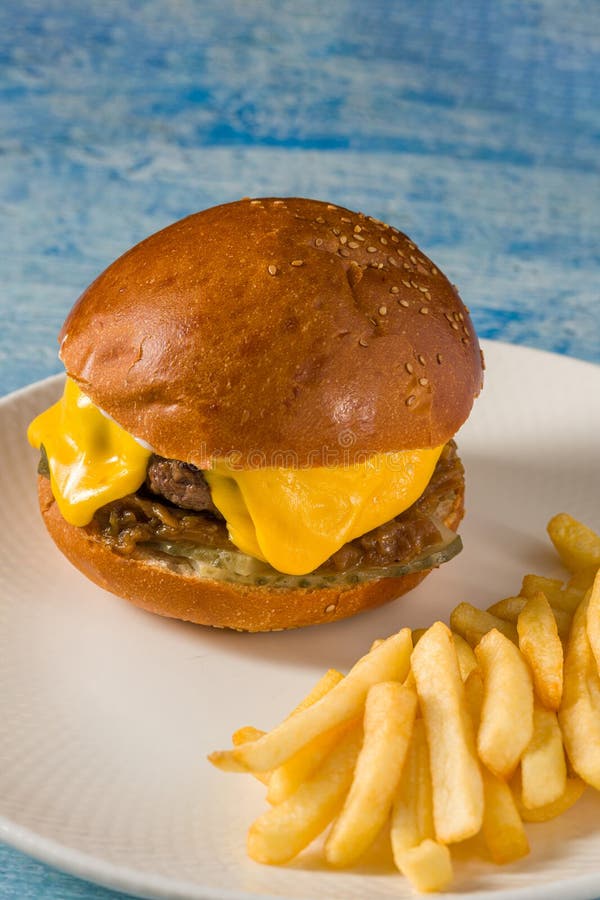 Smash Burger with Cheddar Cheese and Caramelized Onions, Served with ...