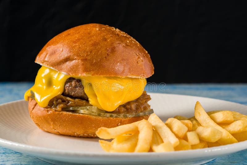 Smash Burger with Cheddar Cheese and Caramelized Onions, Served with ...