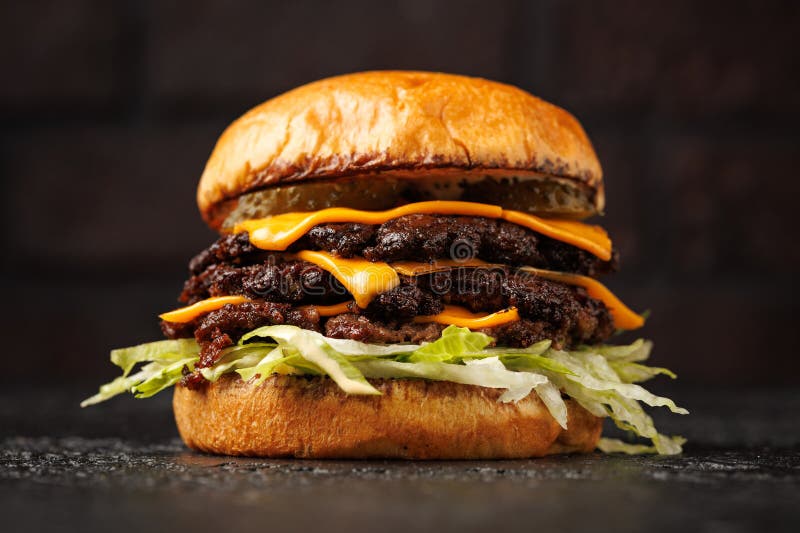 Smash Burger with Lettuce, Cheddar Cheese and Sauce Stock Photo - Image ...
