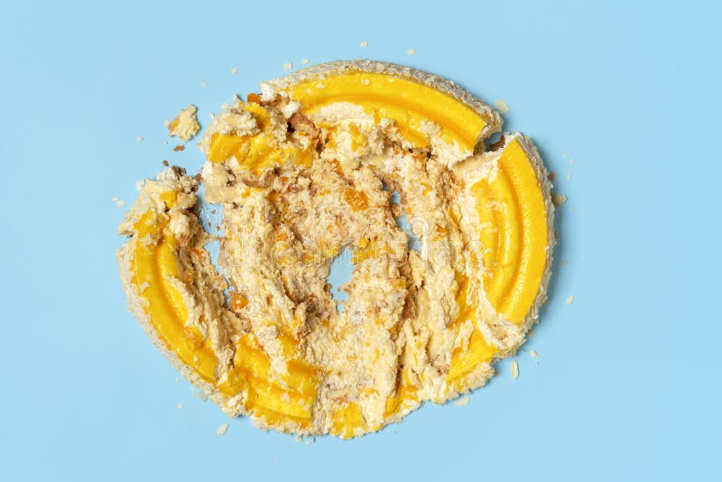 Smashed Cake Top View on Blue Background. Destroyed Orange Cake Stock ...