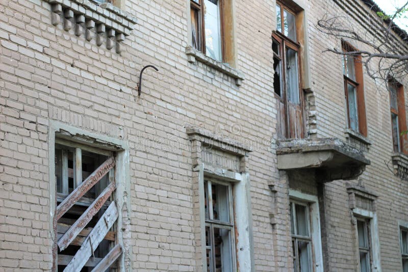 Smashed a Shot of an Old Brick Building Planked Windows at the Donbass ...