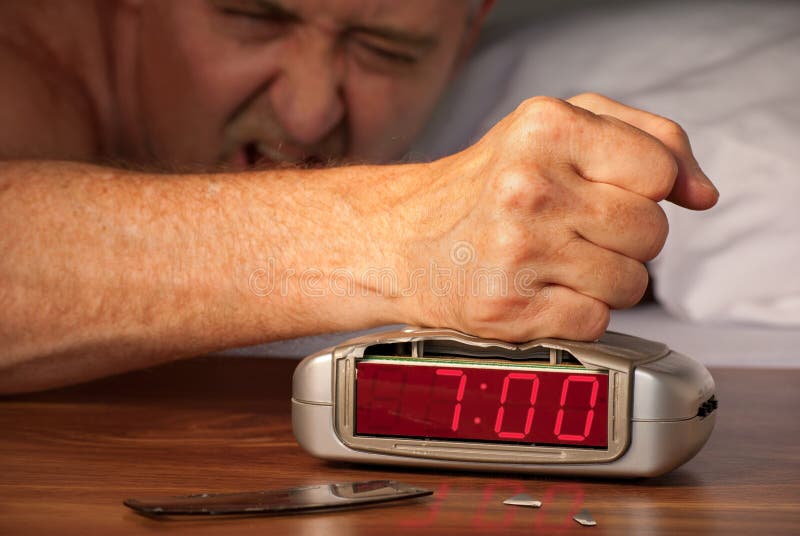 Smashing an Alarm Clock stock photo. Image of doze, slumber - 1099004