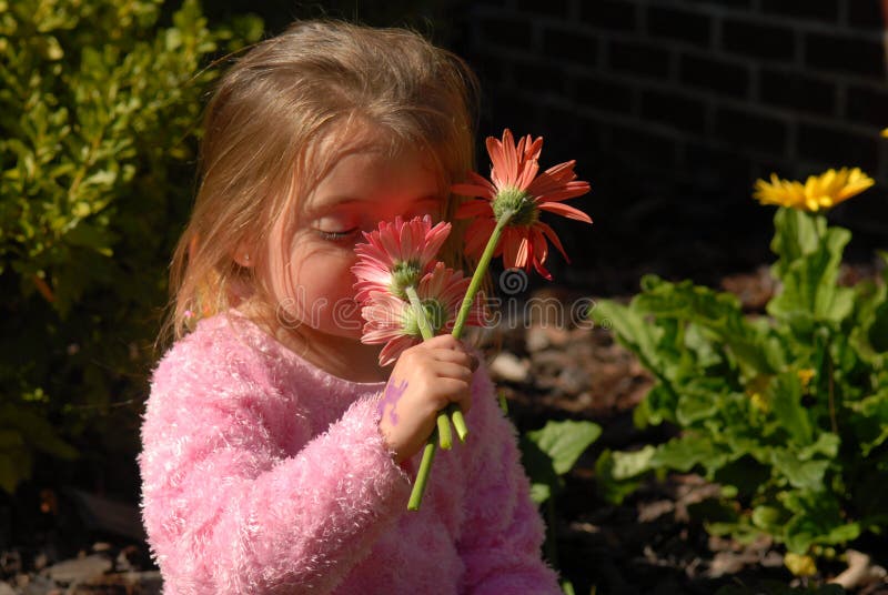 These Smell Good! stock image. Image of children, beautiful - 1410297