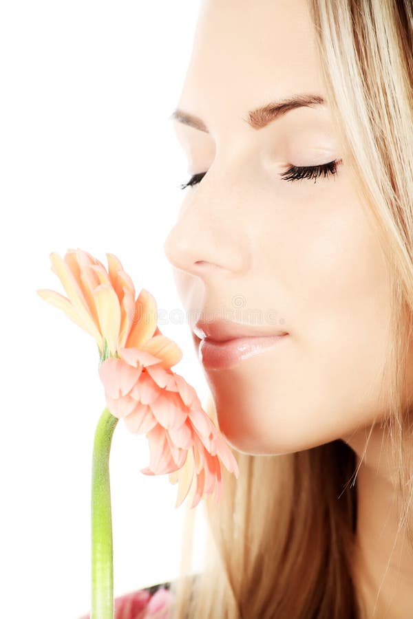 Smelling a flower stock image. Image of female, attractive - 9673807