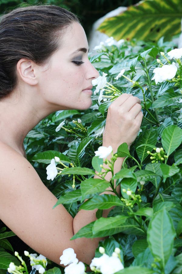 Smelling flowers stock photo. Image of stylish, fashionable - 5909826