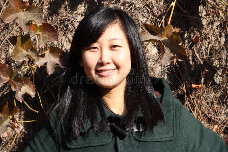 Smiling Chinese Lady stock photo. Image of woman, sitting - 6874234