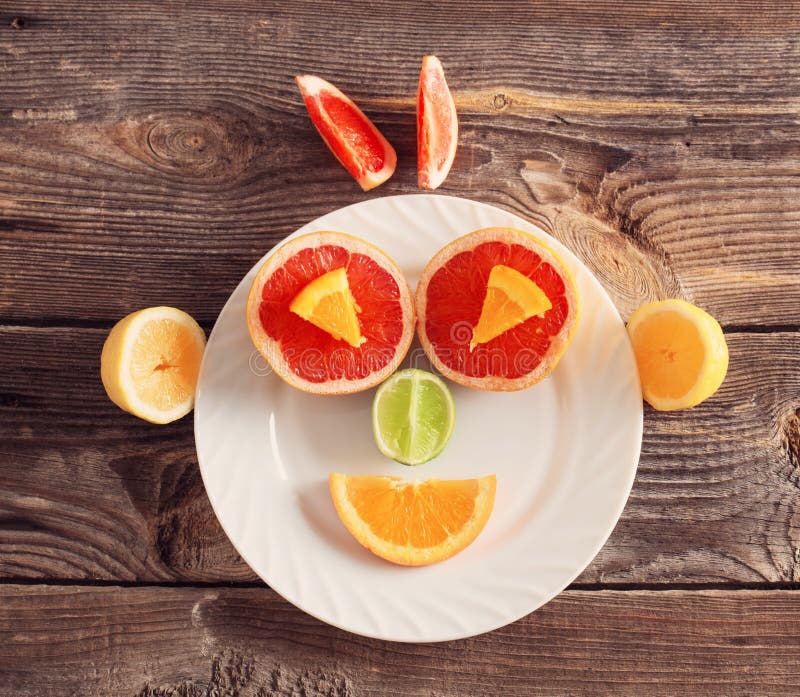 Smile Citrus Fruit on Plate Stock Image - Image of diet, ripe: 62543393