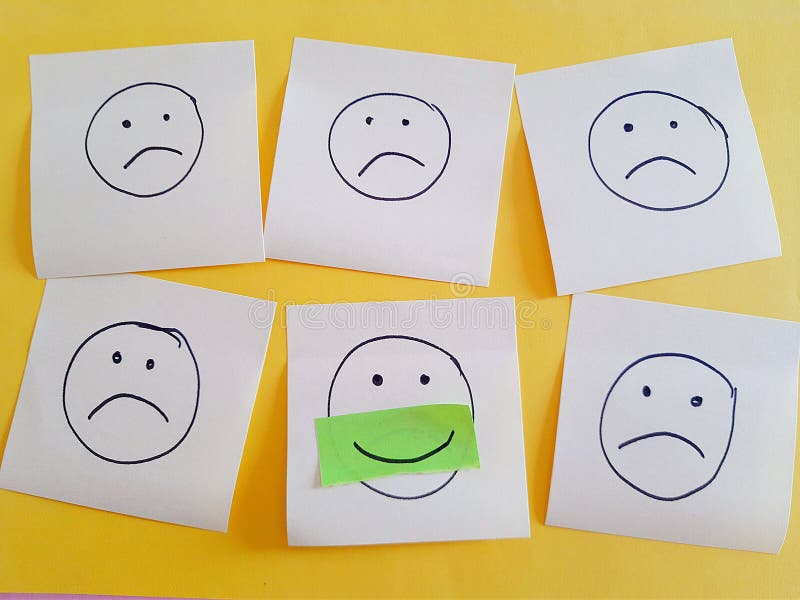 Smile, Concept, a Smiling Face in the Middle of Five Sad Faces Made of ...