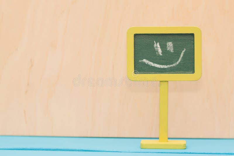 Smile Drawn by Chalk on Tiny Blackboard Stock Image - Image of craft ...