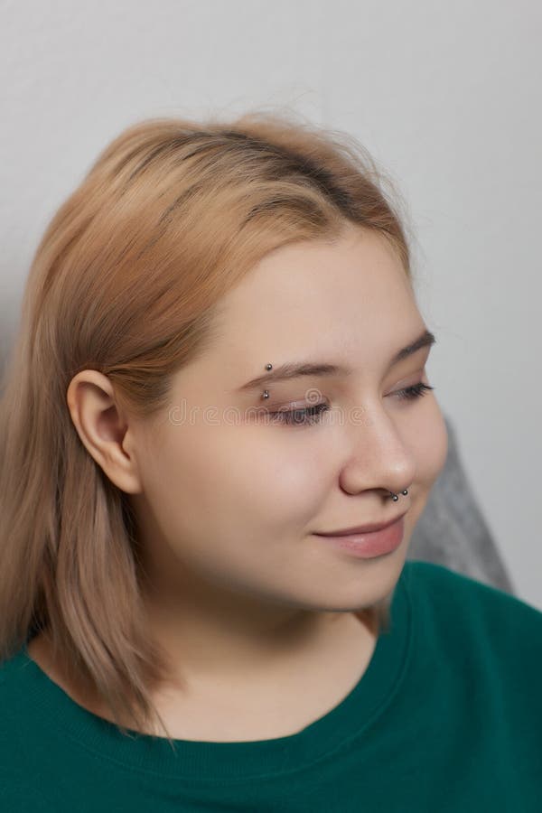 Smile or Frenulum Piercing Under the Upper Lip. Stock Image - Image of ...